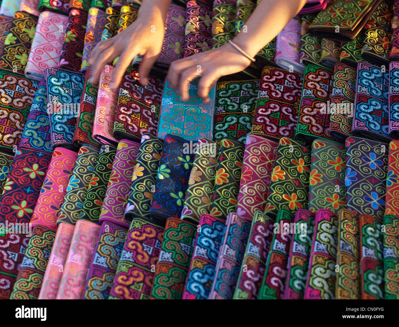 Colorful wallets in market Stock Photo - Alamy