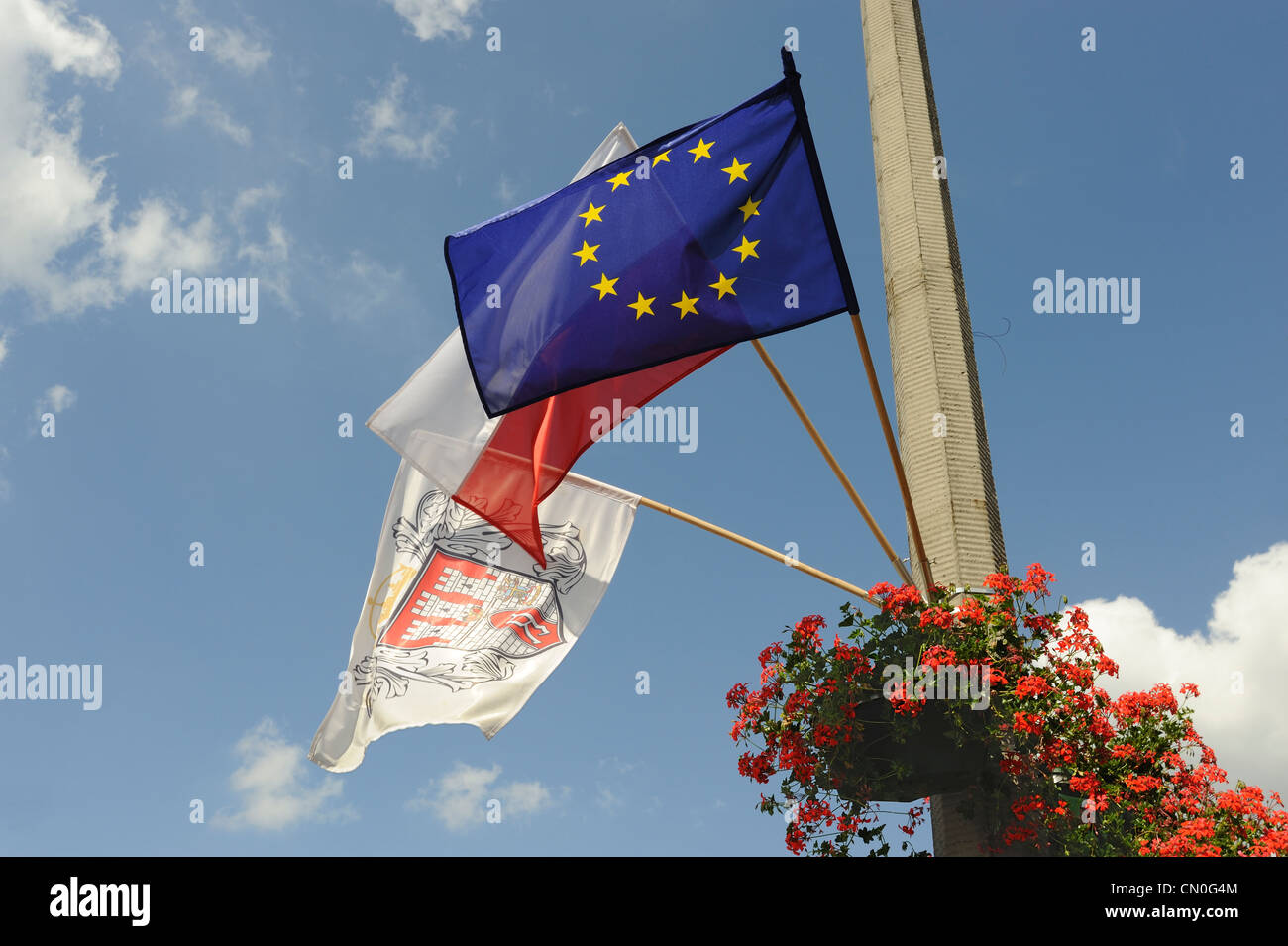 National, EU and the city of Radom flags on a lamp post, Radom, Poland ...