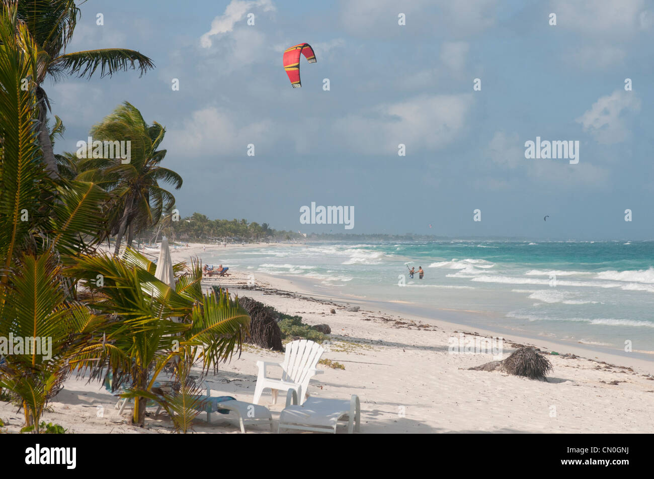 kite surfing on deserted white sand beach Tulum Mexico Stock Photo - Alamy