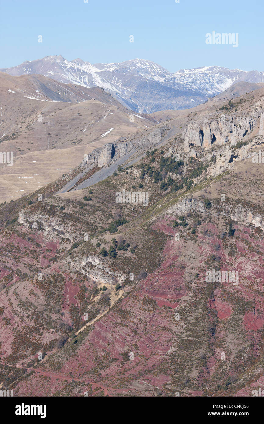 AERIAL VIEW. Red sedimentary rock (pelite) in the foreground with the ...