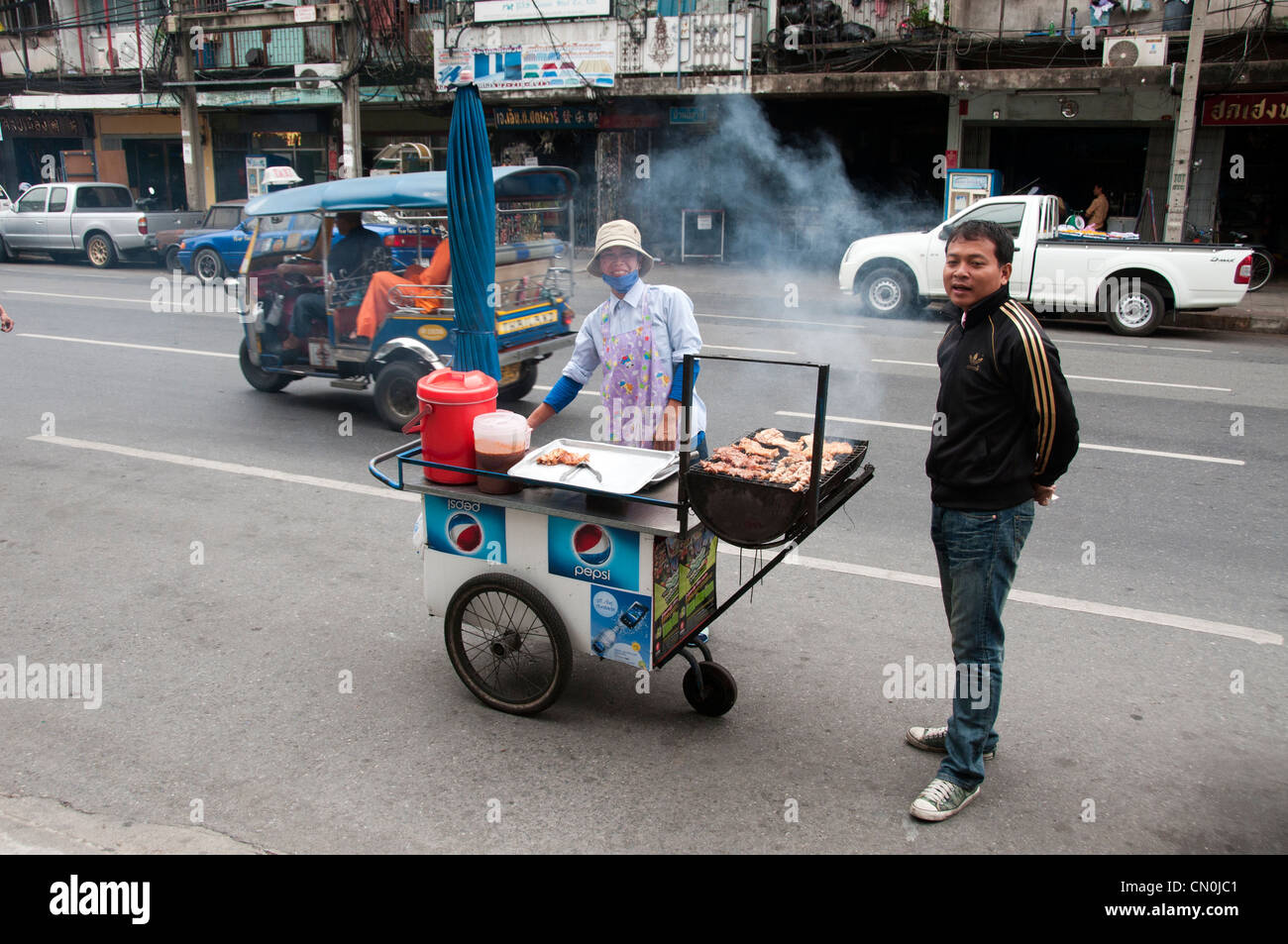 Selling traditional food on the street hi-res stock photography and ...