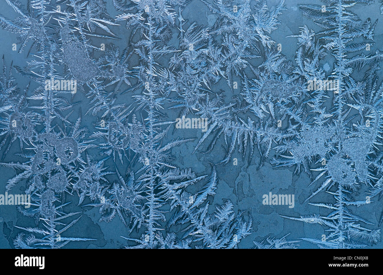 Frost pattern on a window Stock Photo - Alamy