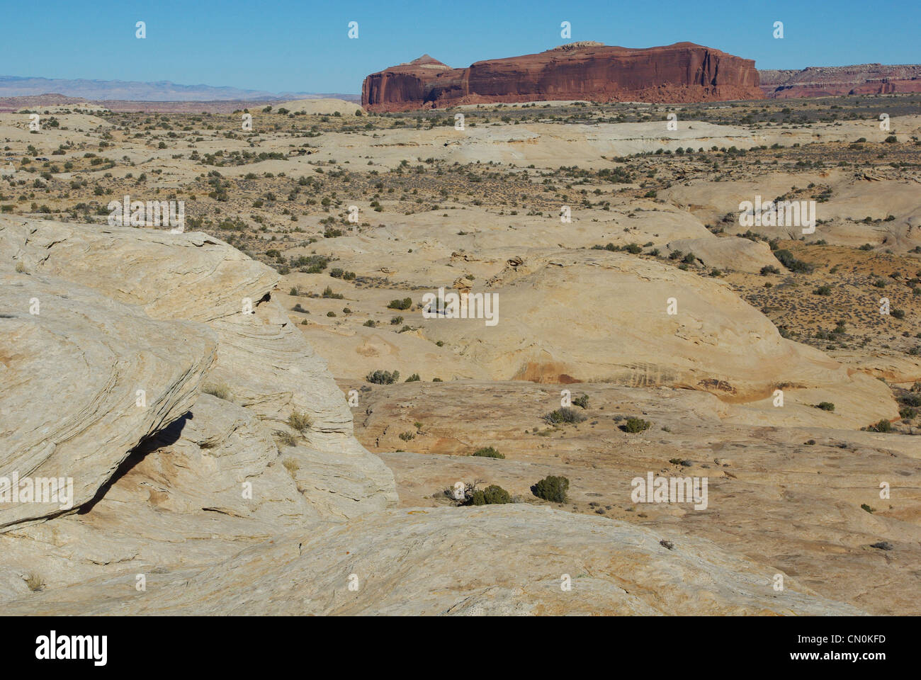 High above Secret Spire with white and red rocks under blue sky, Utah ...