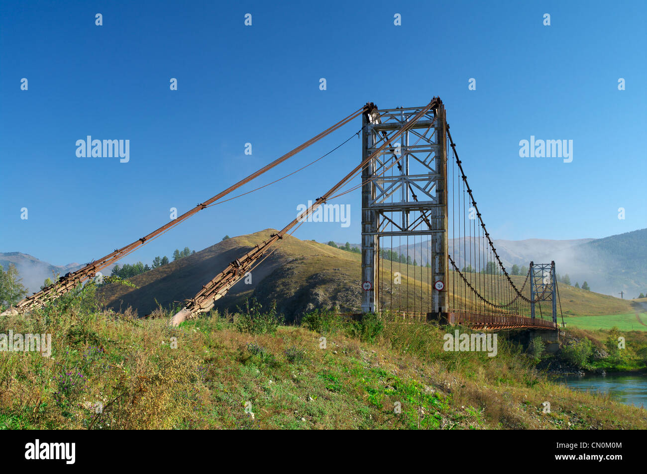 Old suspension bridge in the Altay mountains Stock Photo - Alamy