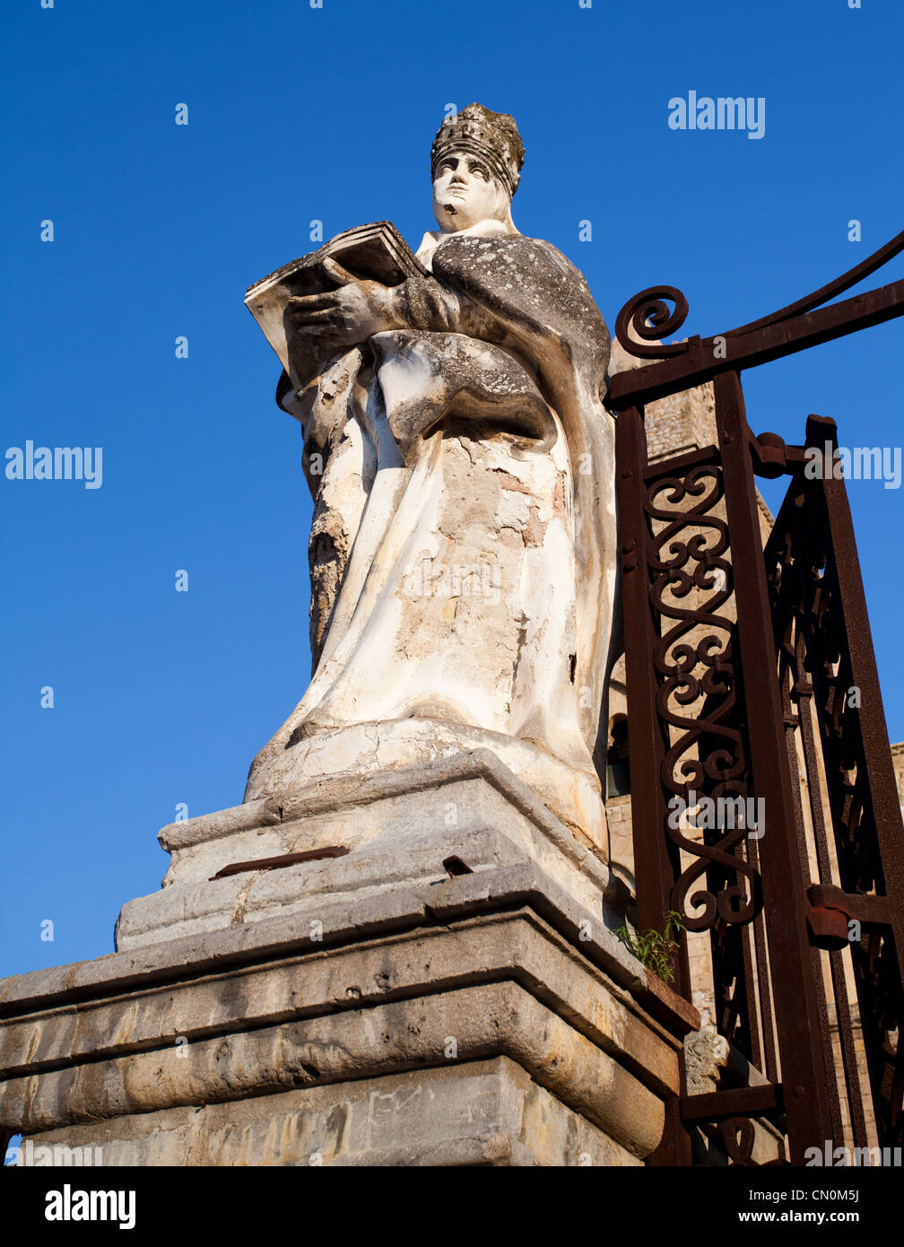 A statue on the outside of The Cathedral-Basilica of Cefalù Stock Photo ...