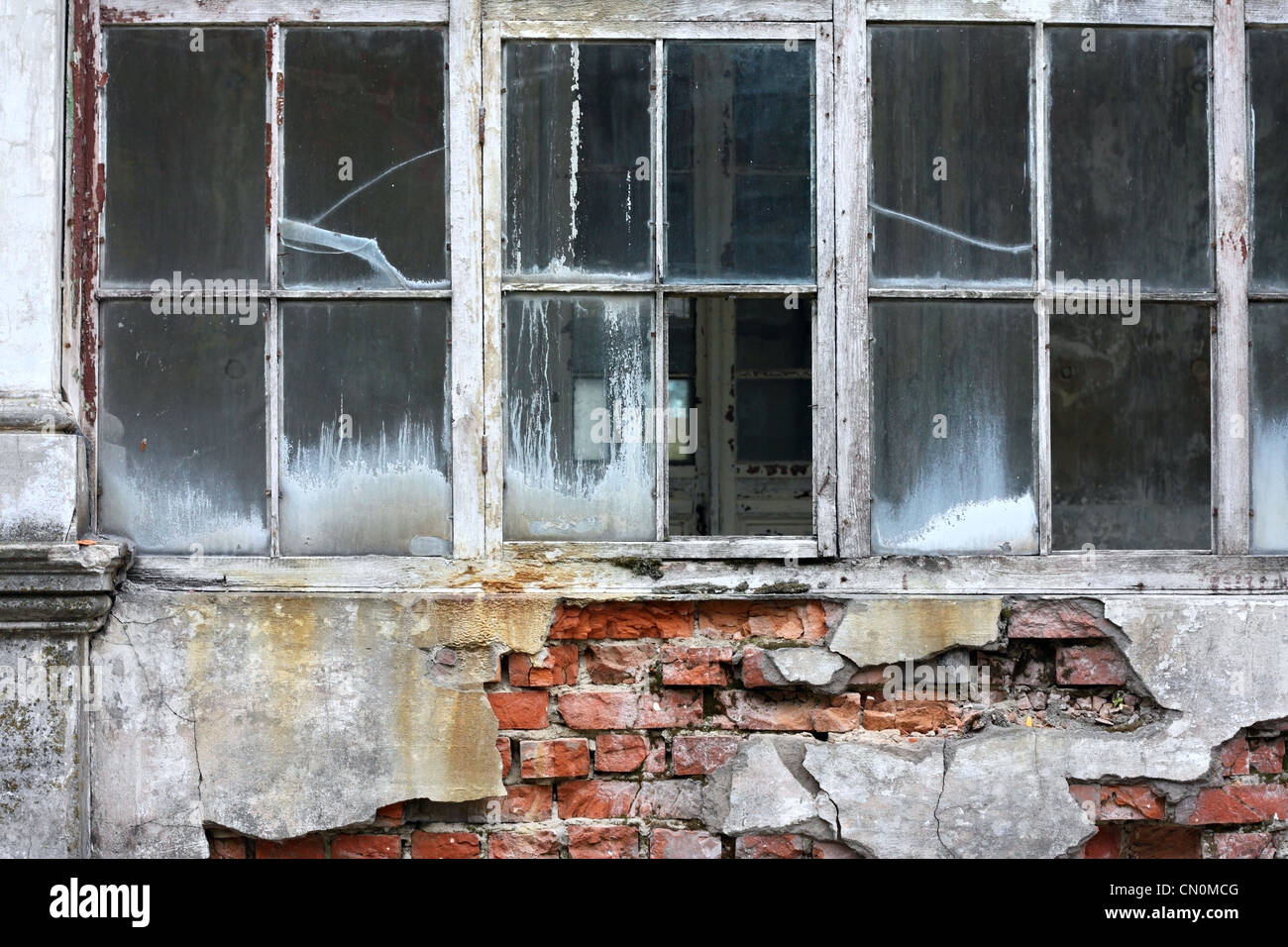 Broken window at the demolished wall Stock Photo - Alamy
