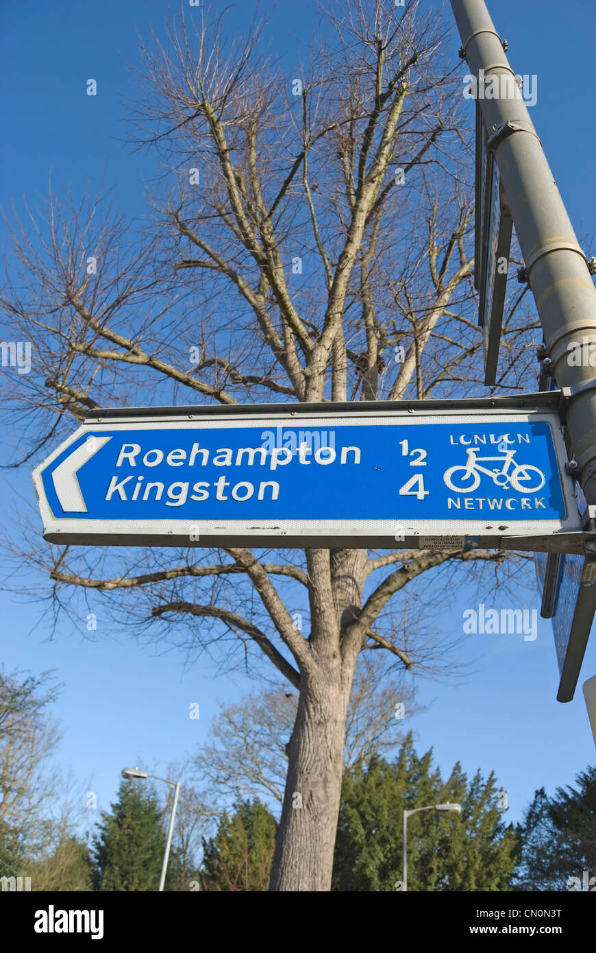 london network cycle sign giving direction and distances to roehampton ...