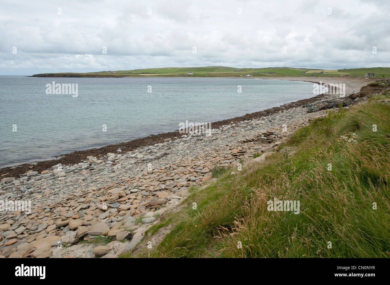 The Bay of Skaill at the neolithical stone settlement of Skara Brae on ...
