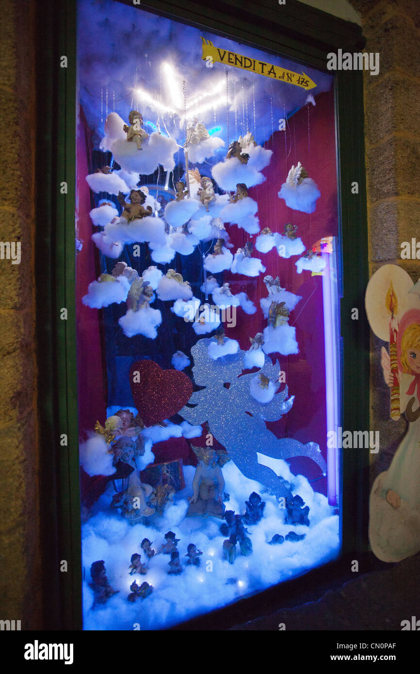 A store window displaying angels on clouds Stock Photo - Alamy