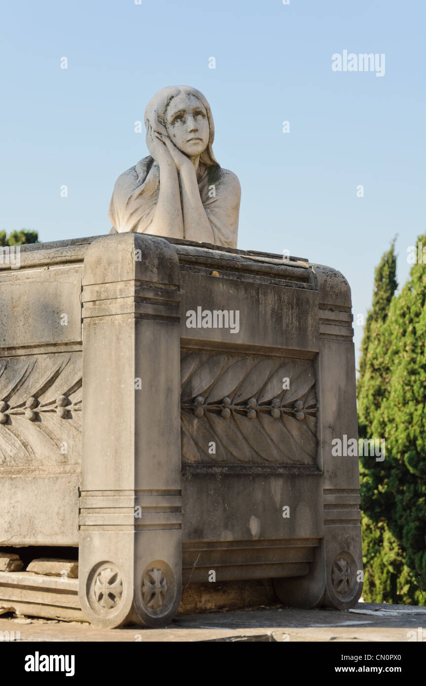 Tomb decorated with statues and sculptures in the monumental cemetery ...