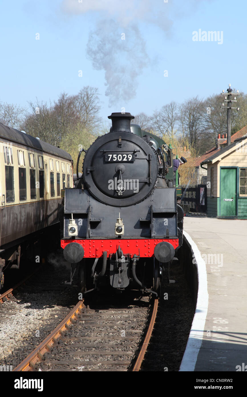 North Yorkshire Moors Railway steam train approaching Pickering station ...