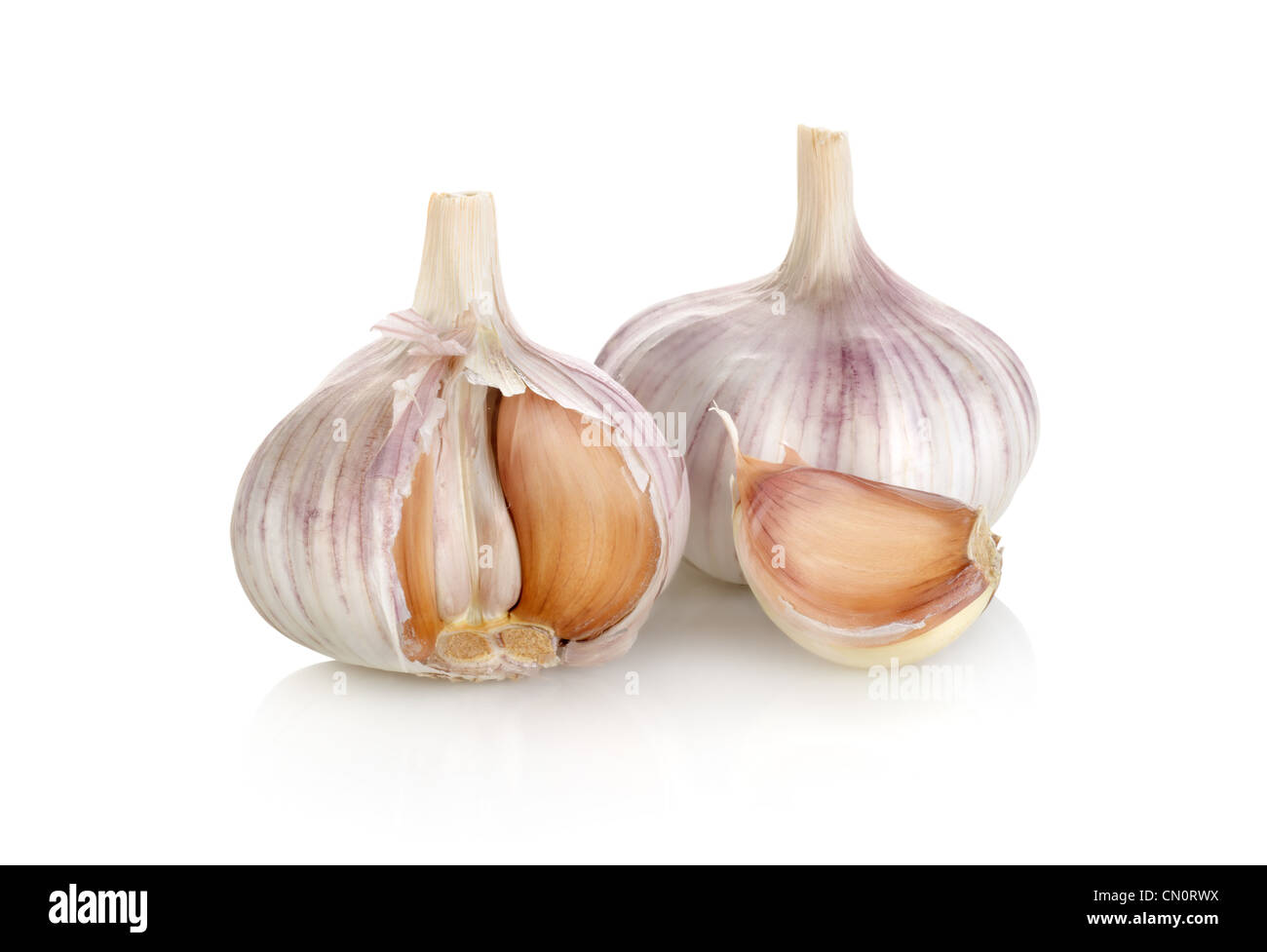 Raw garlic isolated on a white background Stock Photo - Alamy