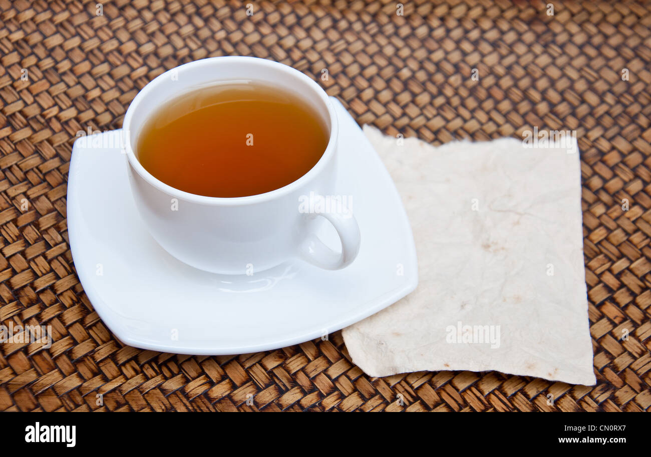 Tea and blank paper on sedge background Stock Photo - Alamy