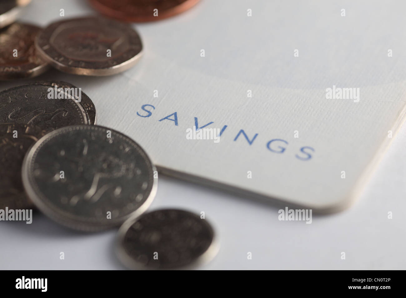 savings book with coins Stock Photo - Alamy