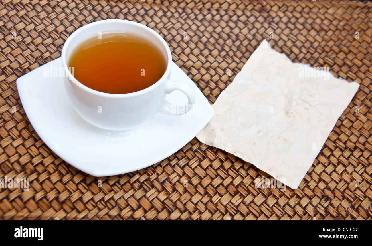 Tea and blank paper on sedge background Stock Photo - Alamy