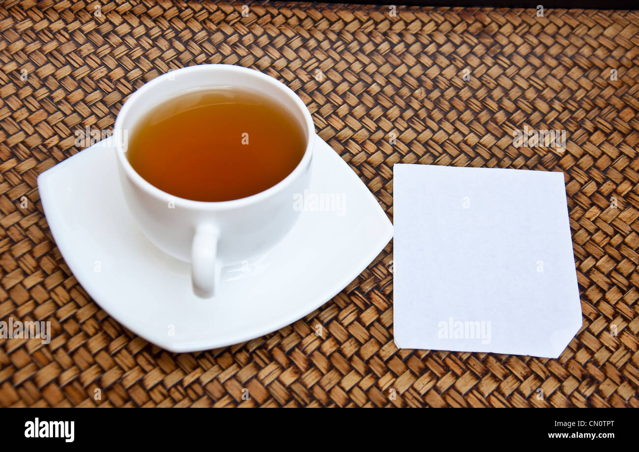 Tea and blank paper on sedge background Stock Photo - Alamy