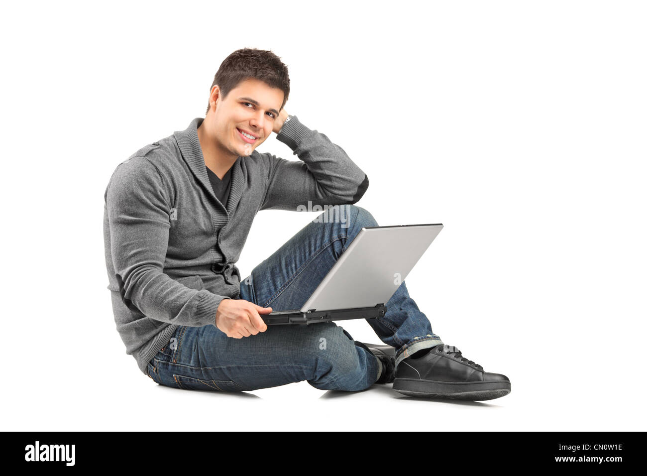 Happy guy laptop looking camera Cut Out Stock Images & Pictures - Alamy