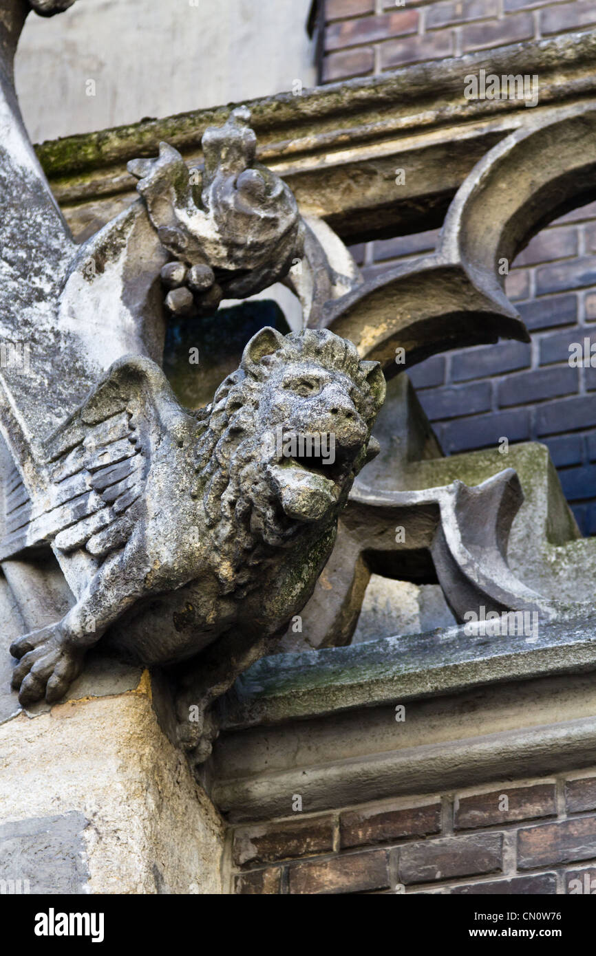 A lion with wings sculpture on a church in Vienna Stock Photo - Alamy