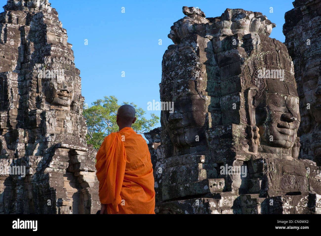 Monk with huge smiling face at Bayon Temple, Angkor Thom, UNESCO World ...