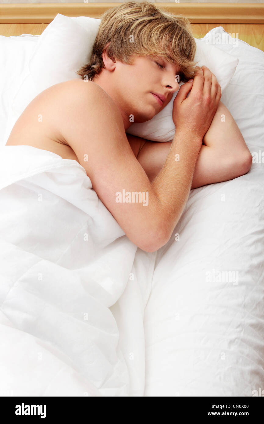 Man comfortably sleeping in his bed Stock Photo - Alamy Man comfortably sleeping in his bed Stock Photo - Alamy