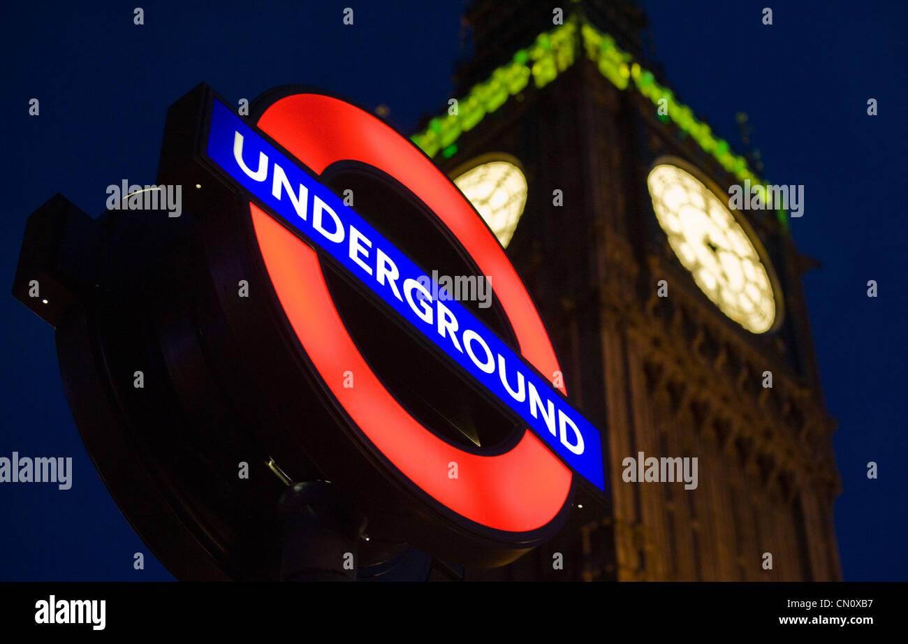Underground Tube sign in front of Big Ben of the Palace of Westminster ...