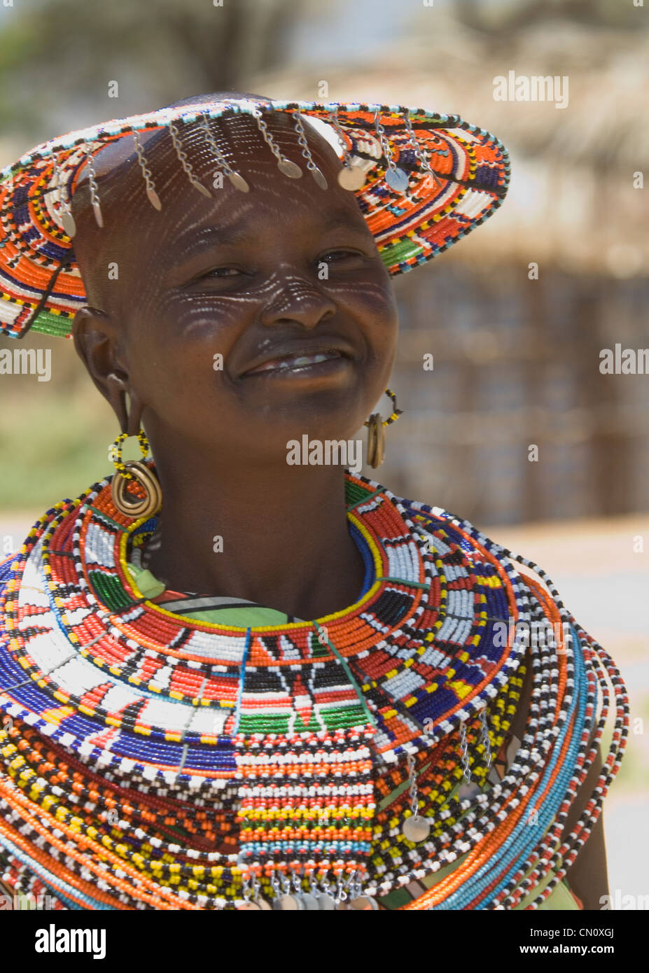 Samburu woman with decorative hat Stock Photo - Alamy