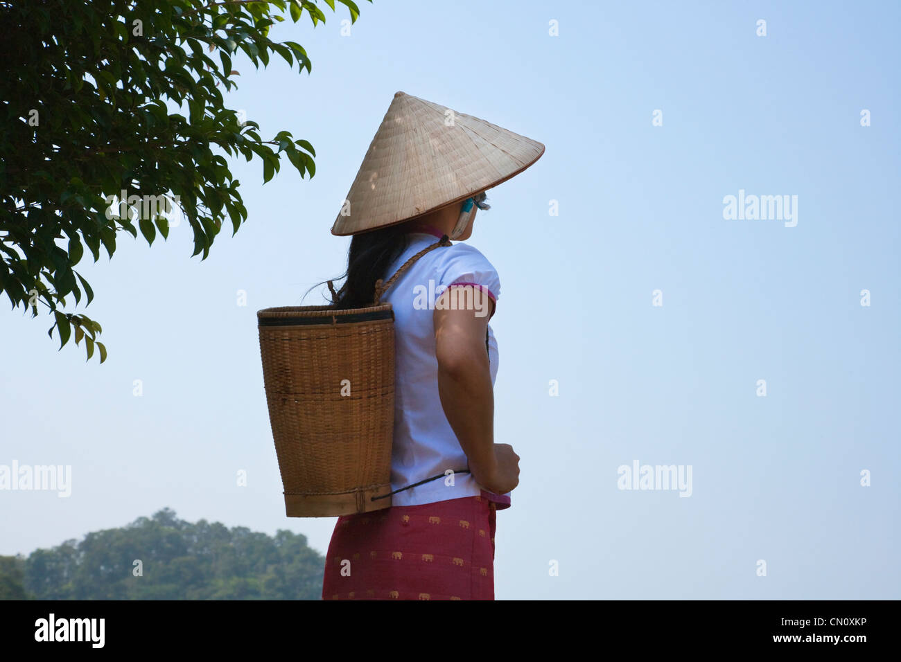 Tribal girl with conical hat, Buon Ma Thuot, Vietnam Stock Photo - Alamy