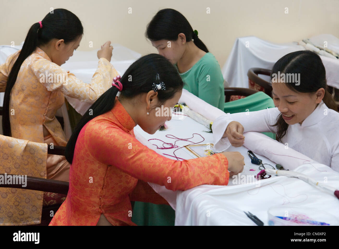 Girls doing embroidery, Nha Trang, Vietnam Stock Photo - Alamy