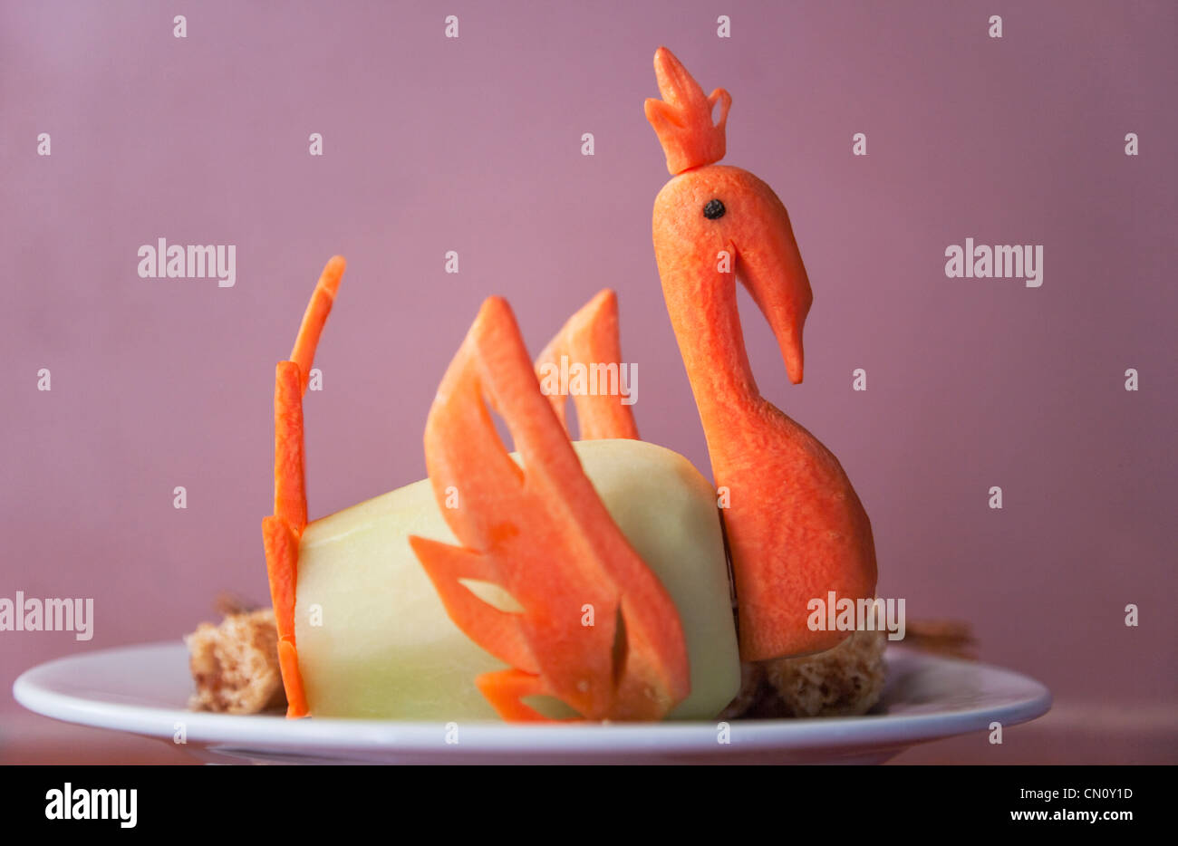 Vegetable carved decoration on food dish, Hue, Vietnam Stock Photo - Alamy