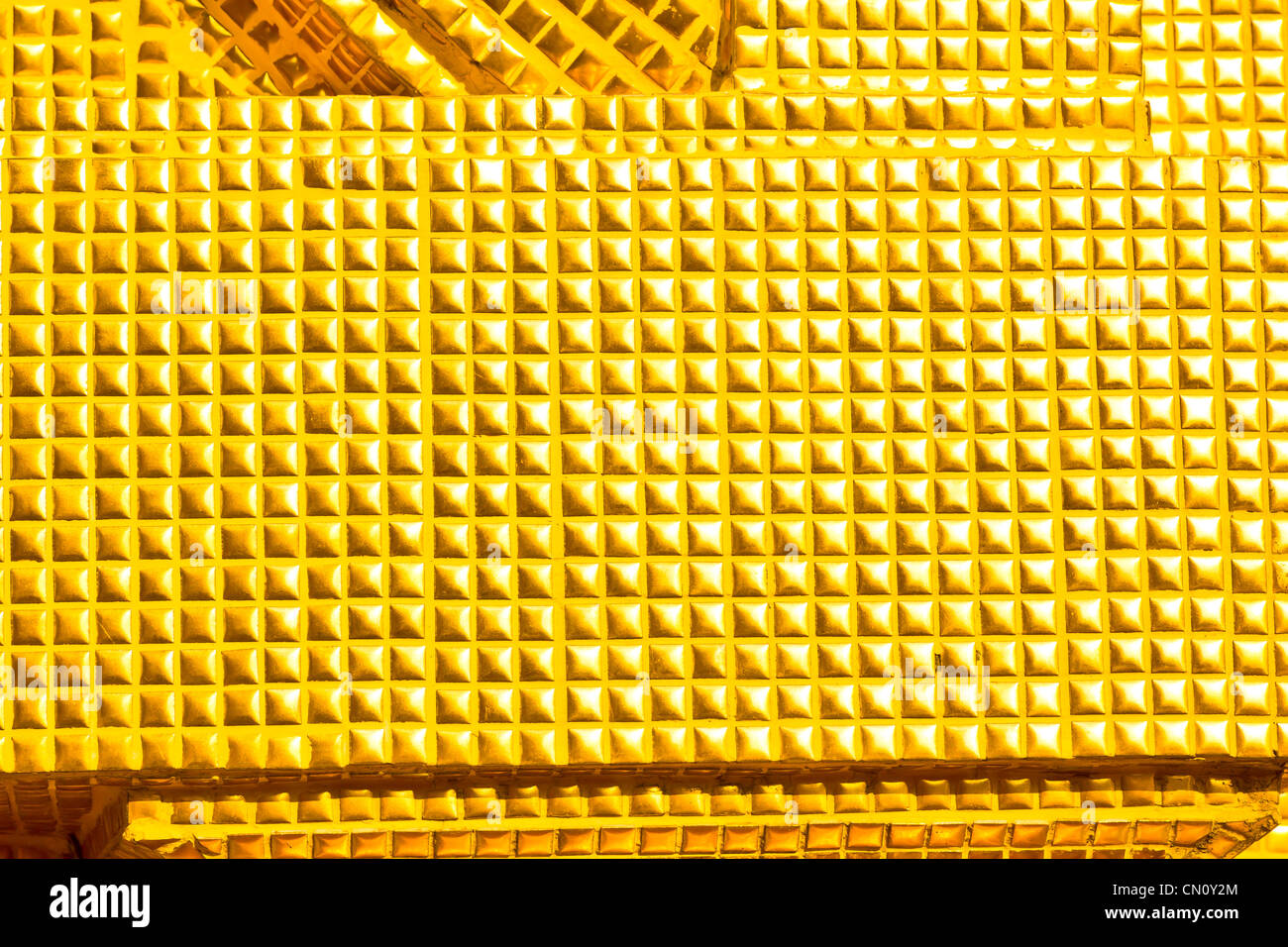 Gold tile background Stock Photo - Alamy