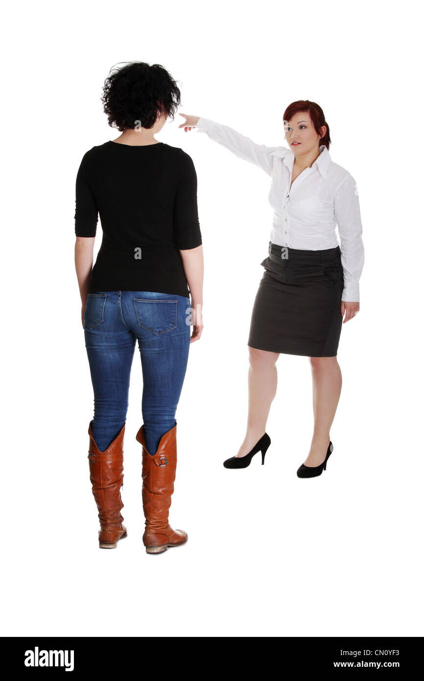 Businesswoman giving reprimand to worker. Isolated on white Stock Photo ...