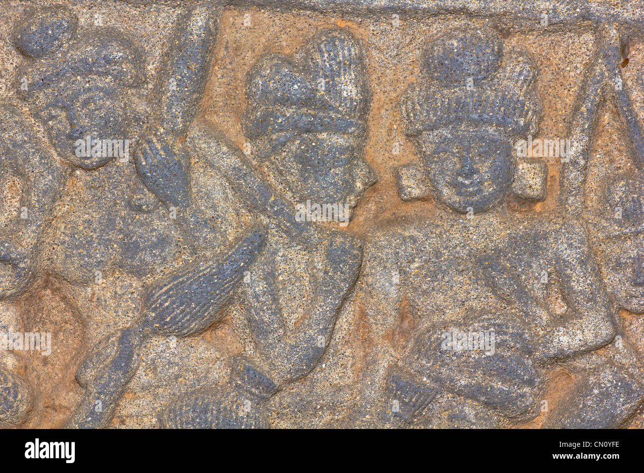 Native art carved on the wall in the temple Stock Photo - Alamy