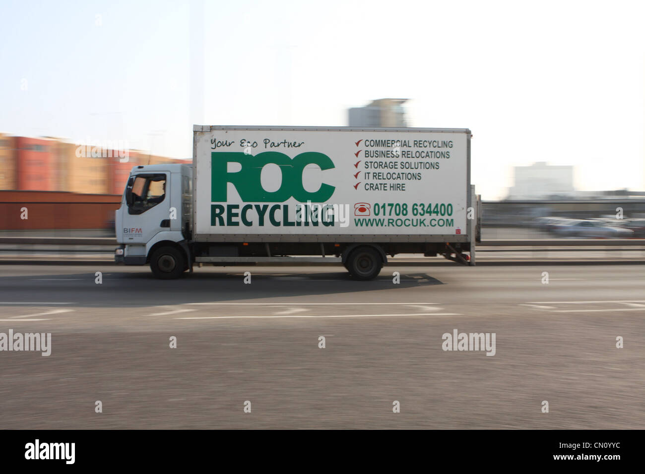 a ROC recycling truck traveling along a road in london Stock Photo - Alamy