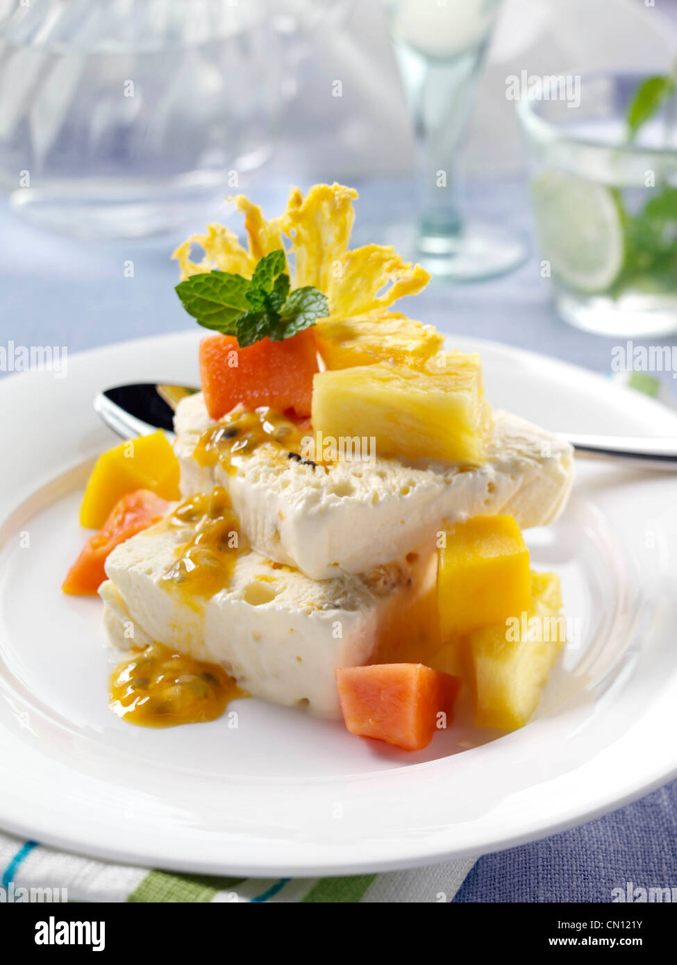 Individual mango pineapple passion fruit salad hi-res stock photography ...