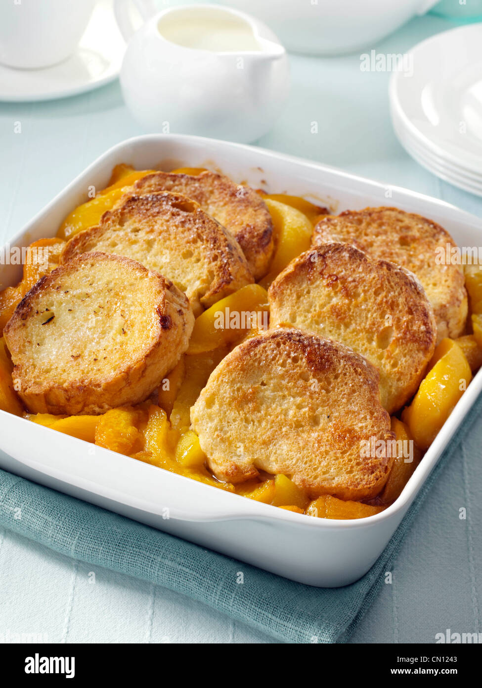 Golden topped peach cobbler dessert hi-res stock photography and images ...