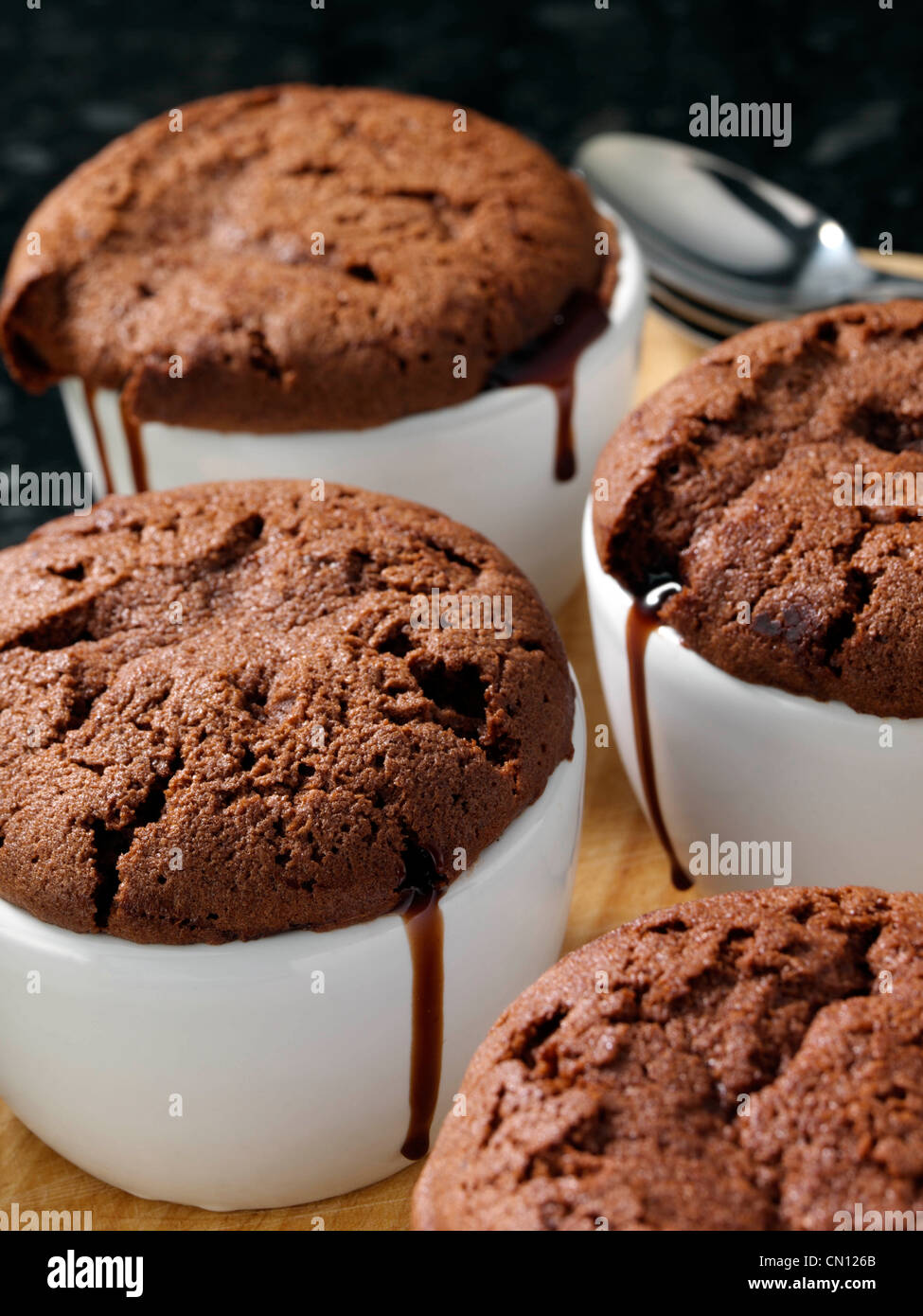 Saucy chocolate pudding indulgent dessert Stock Photo - Alamy