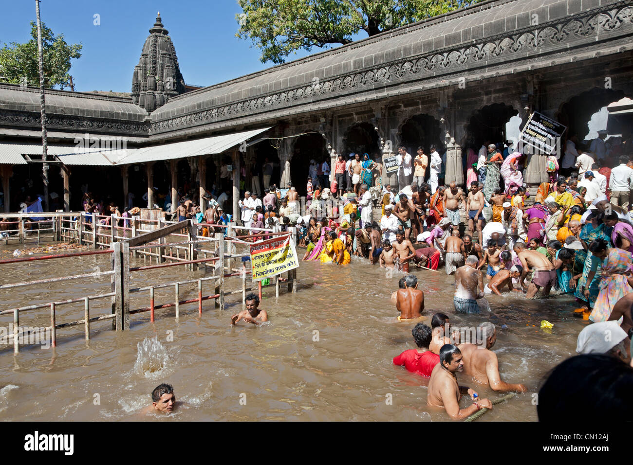 Hindu pilgrims bathing in the sacred water reservoir of Kushavarta (the ...