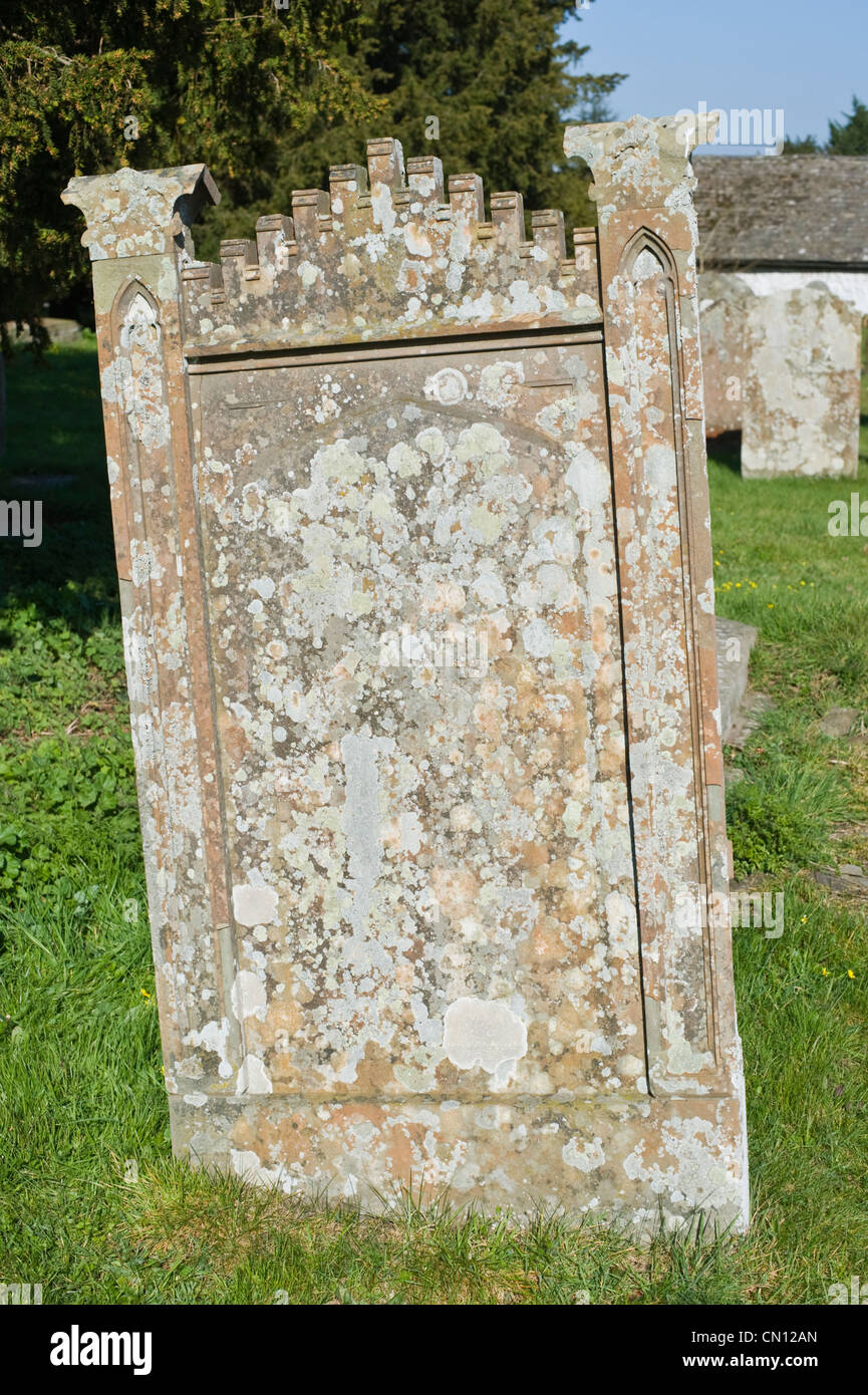 Gravestone with castellated top in graveyard of Clyro Church Powys ...