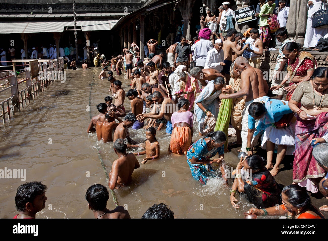 Hindu pilgrims bathing in the sacred water reservoir of Kushavarta (the ...