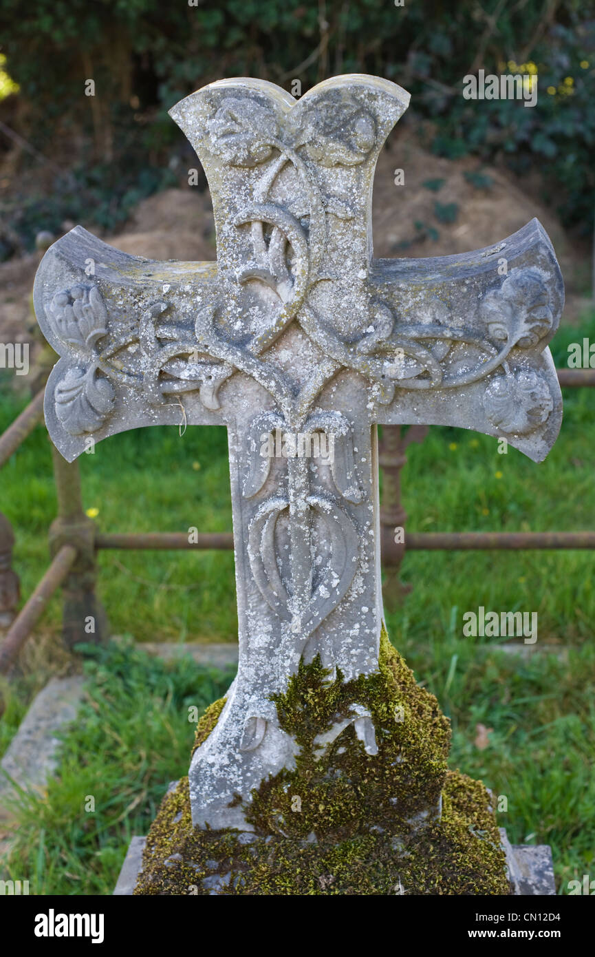 Gravestone in shape of a cross with entwined plant graveyard of Clyro ...