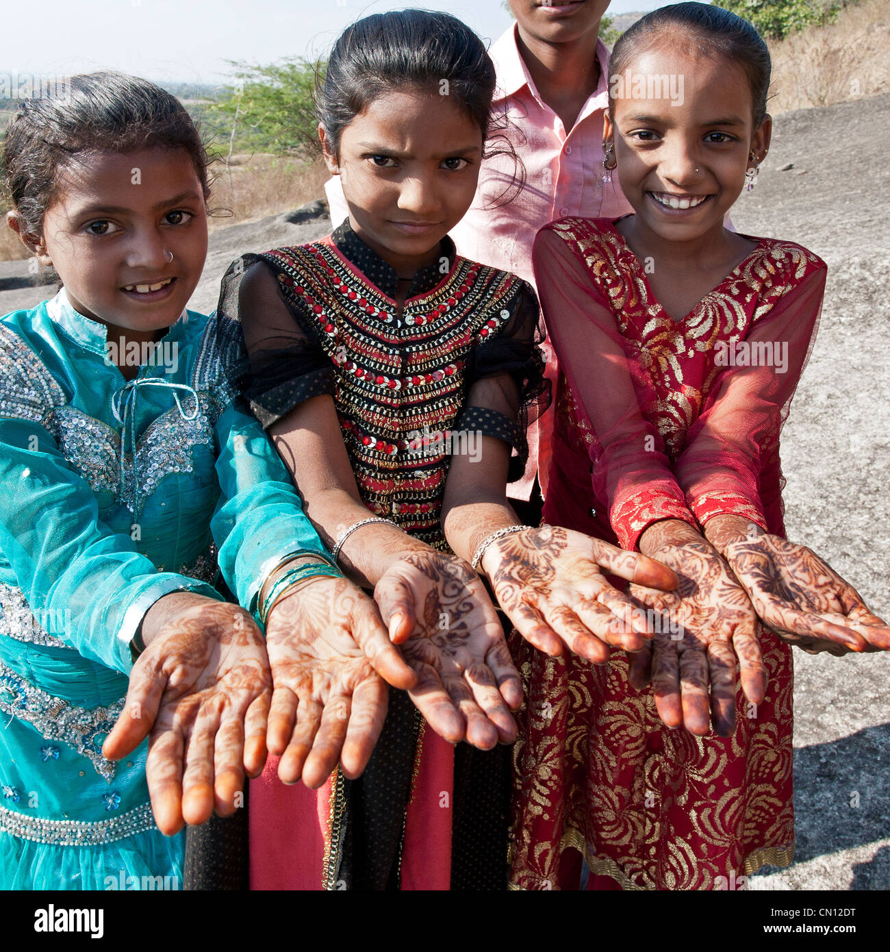 Indian girls showing their hands decorated with henna. Mysore. India ...
