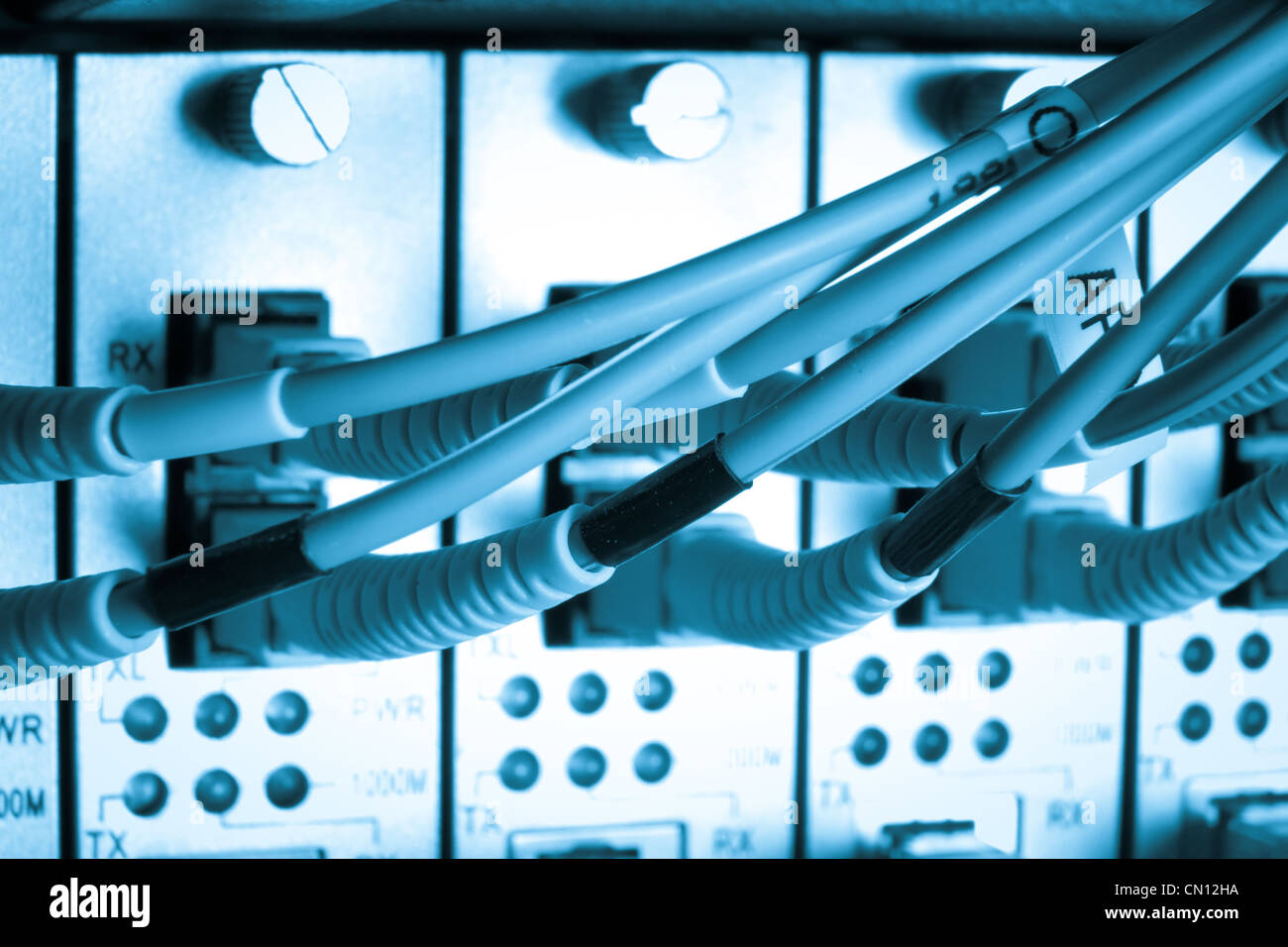 optic fiber cables connected to hub Stock Photo - Alamy