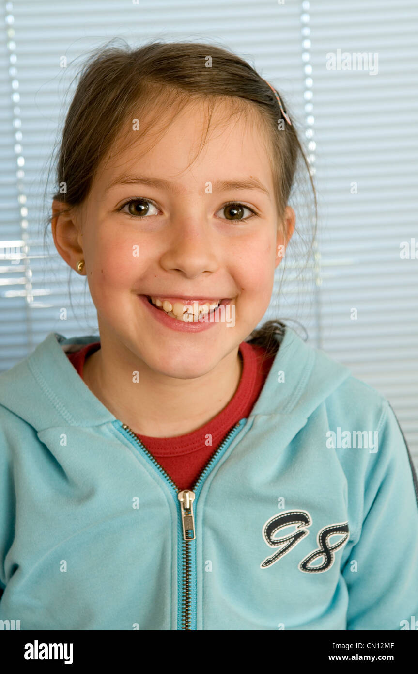 Young girl smiling Stock Photo - Alamy