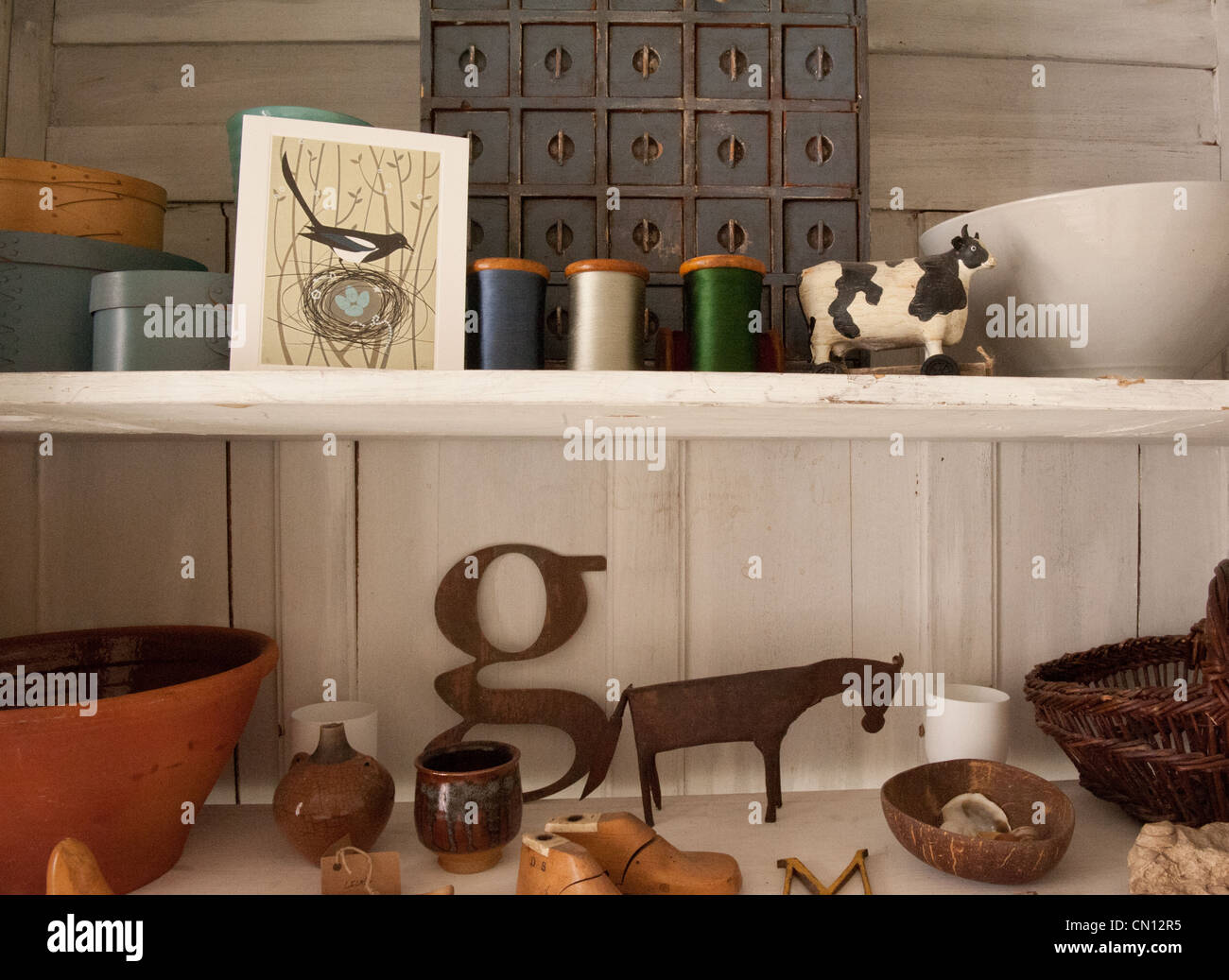 Trinkets in cupboard Stock Photo - Alamy