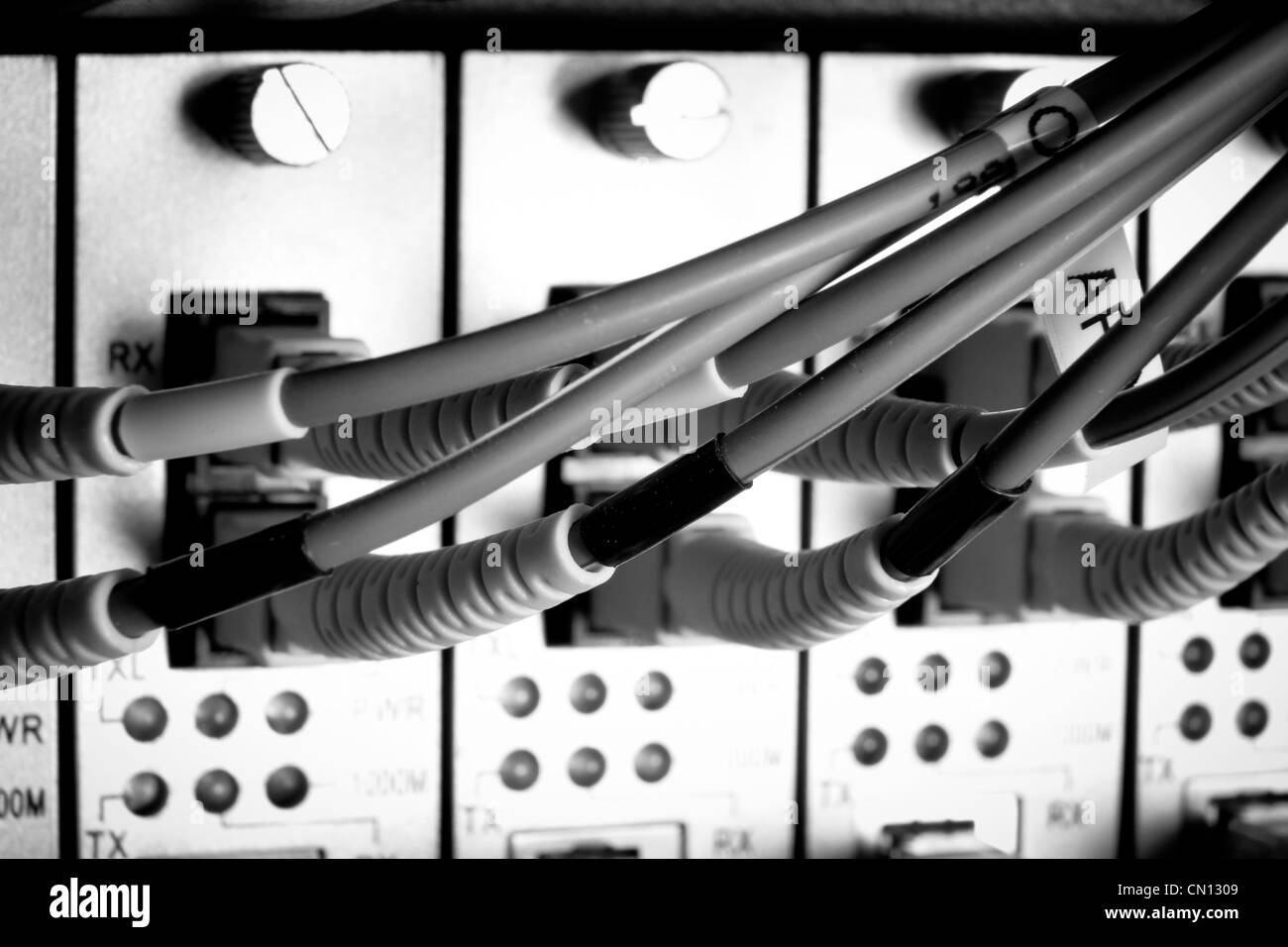 optic fiber cables connected to hub Stock Photo - Alamy