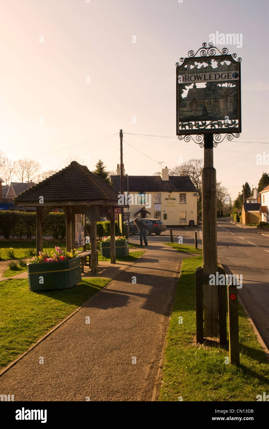 General view of village of Rowledge showing bus stop and local pub ...