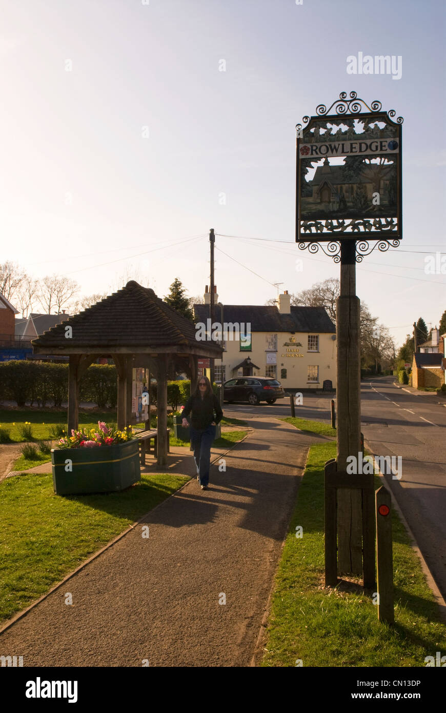 General view of village of Rowledge showing bus stop and local pub ...