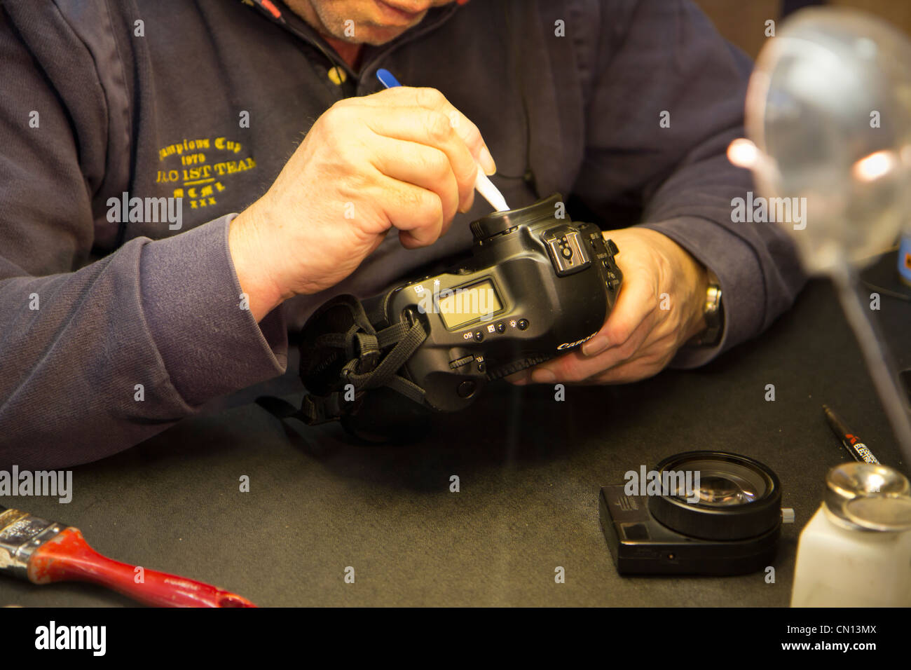 Person cleaning camera sensor hi-res stock photography and images - Alamy