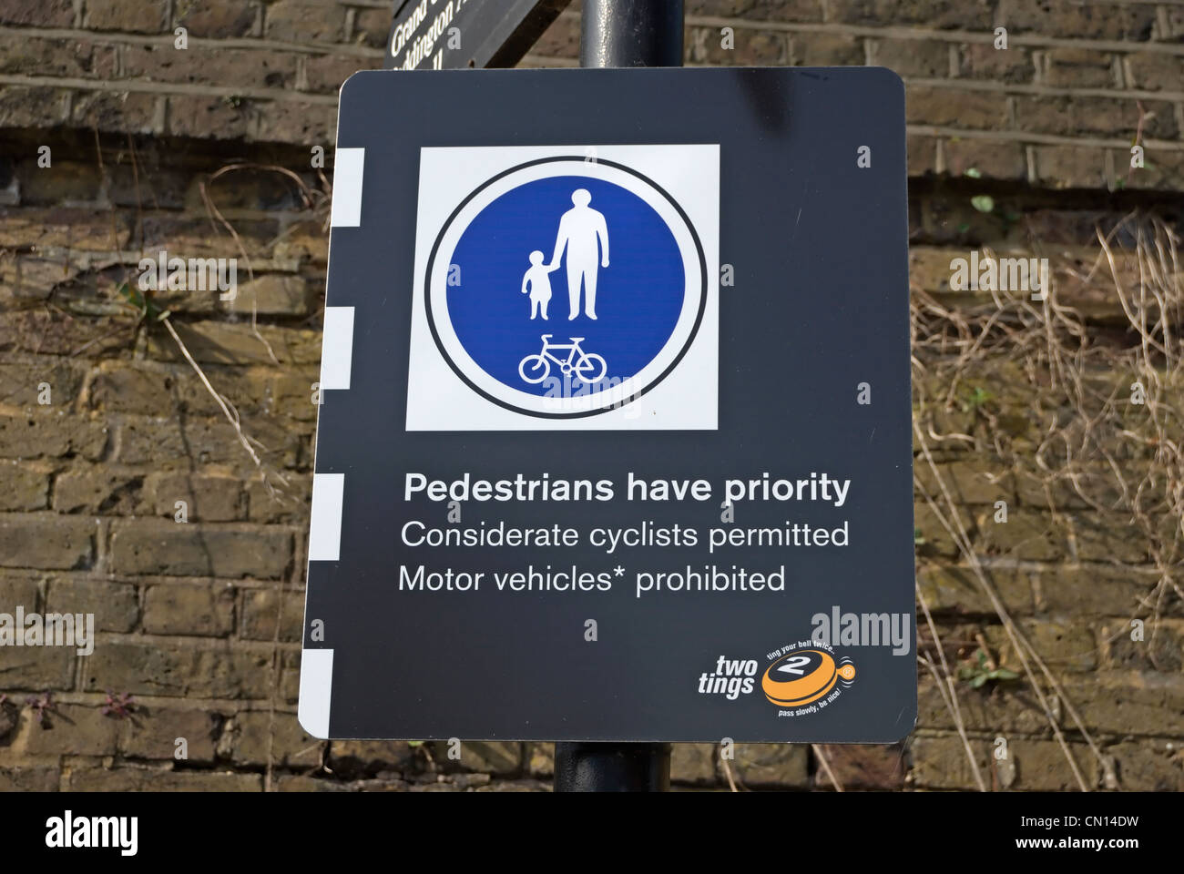 pedestrians have priority sign on the grand union canal towpath at ...