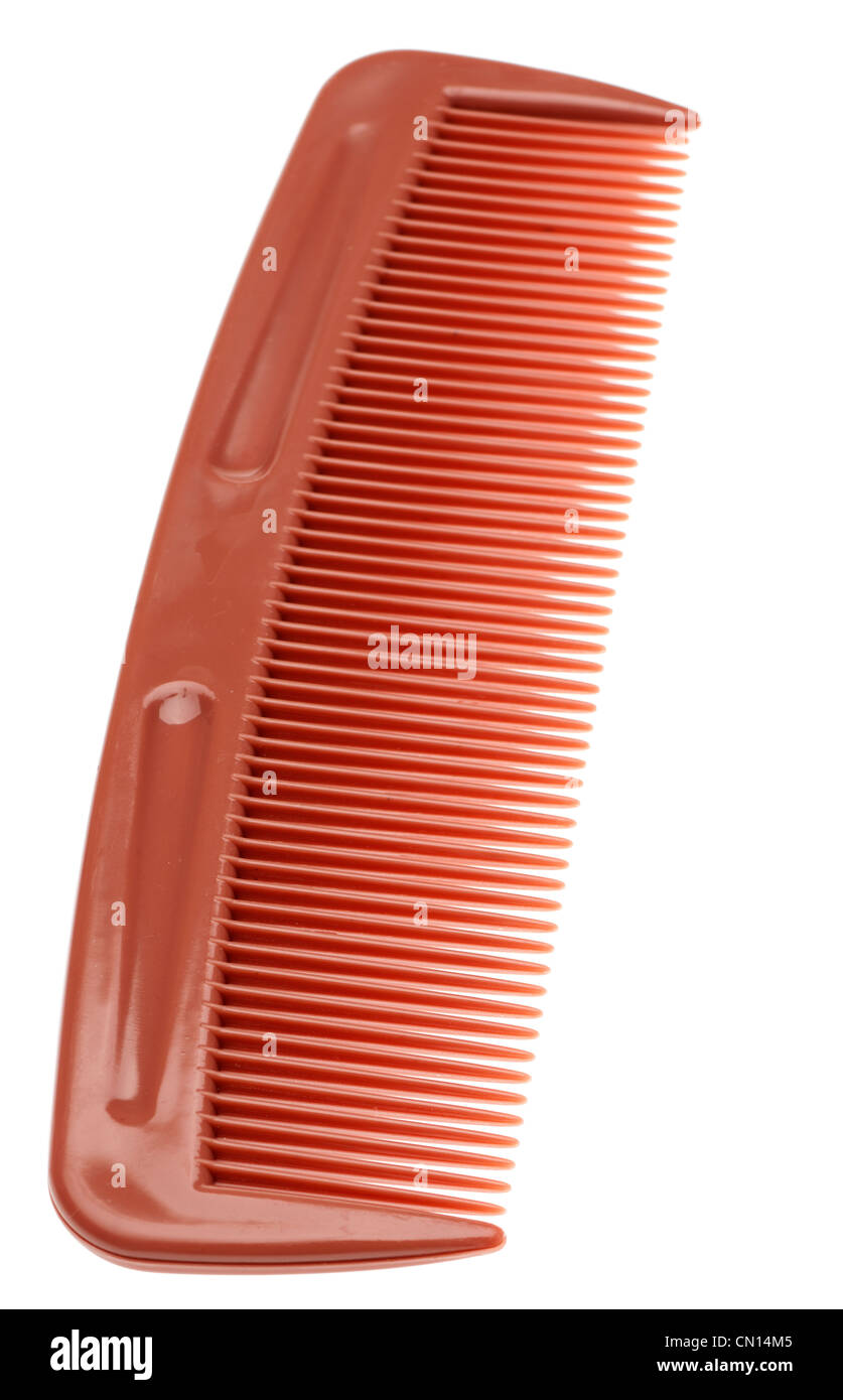 Small brown hair comb Stock Photo - Alamy